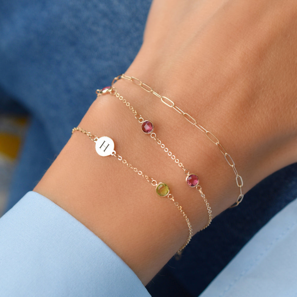 Wondering how best to layer your birthstone bracelets and chains? The ...